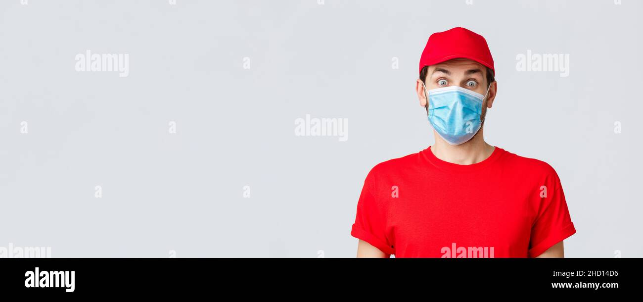 Contactless delivering, covid-19 and shopping concept. Surprised and ...