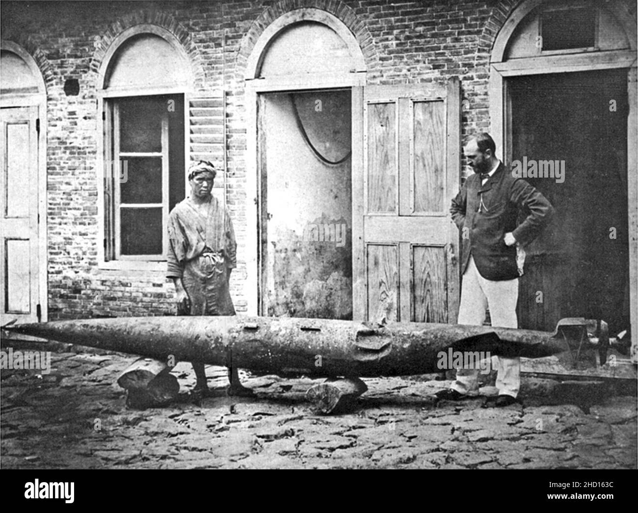 Robert Whitehead with battered test torpedo Fiume c1875 Stock Photo - Alamy