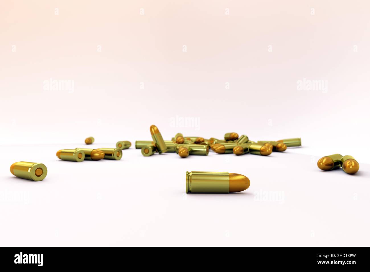 Pile of golden bullets is lying on a random on a white isolated ...