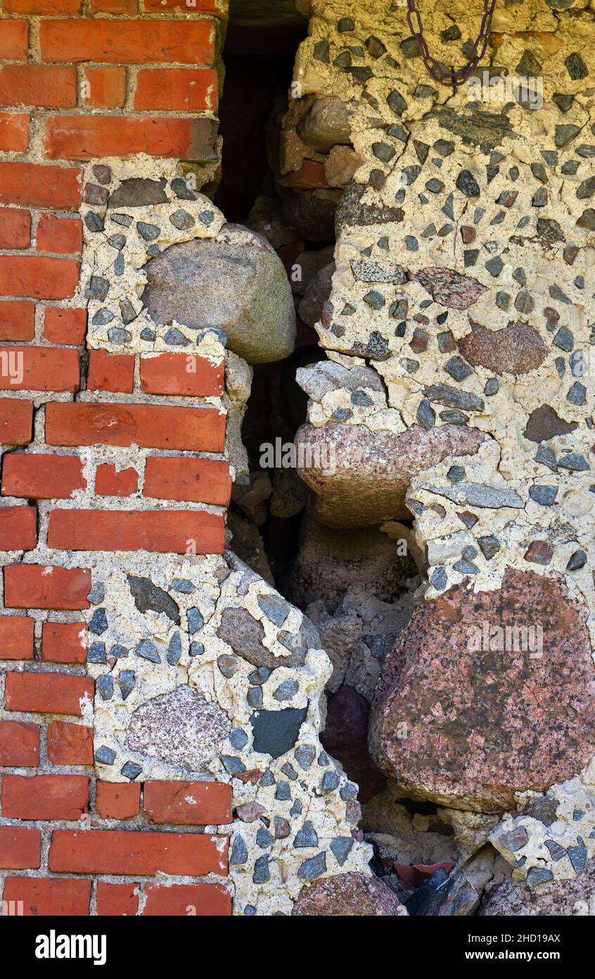 Broken brick and stone wall Stock Photo - Alamy