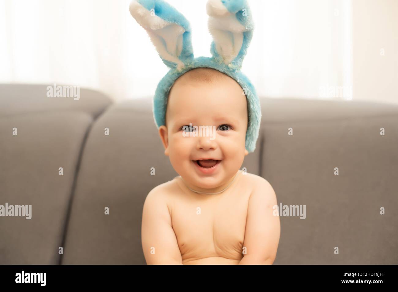 Boy dressed as bunny and Easter eggs Stock Photo - Alamy