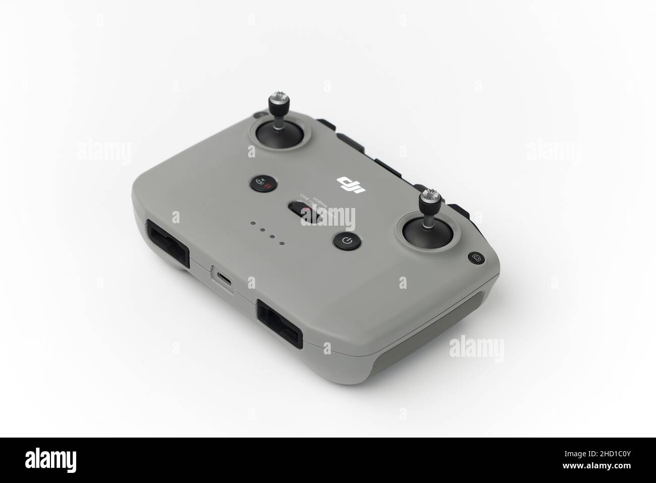 DJI remote control on white background. Control stick of the DJI Mavic ...