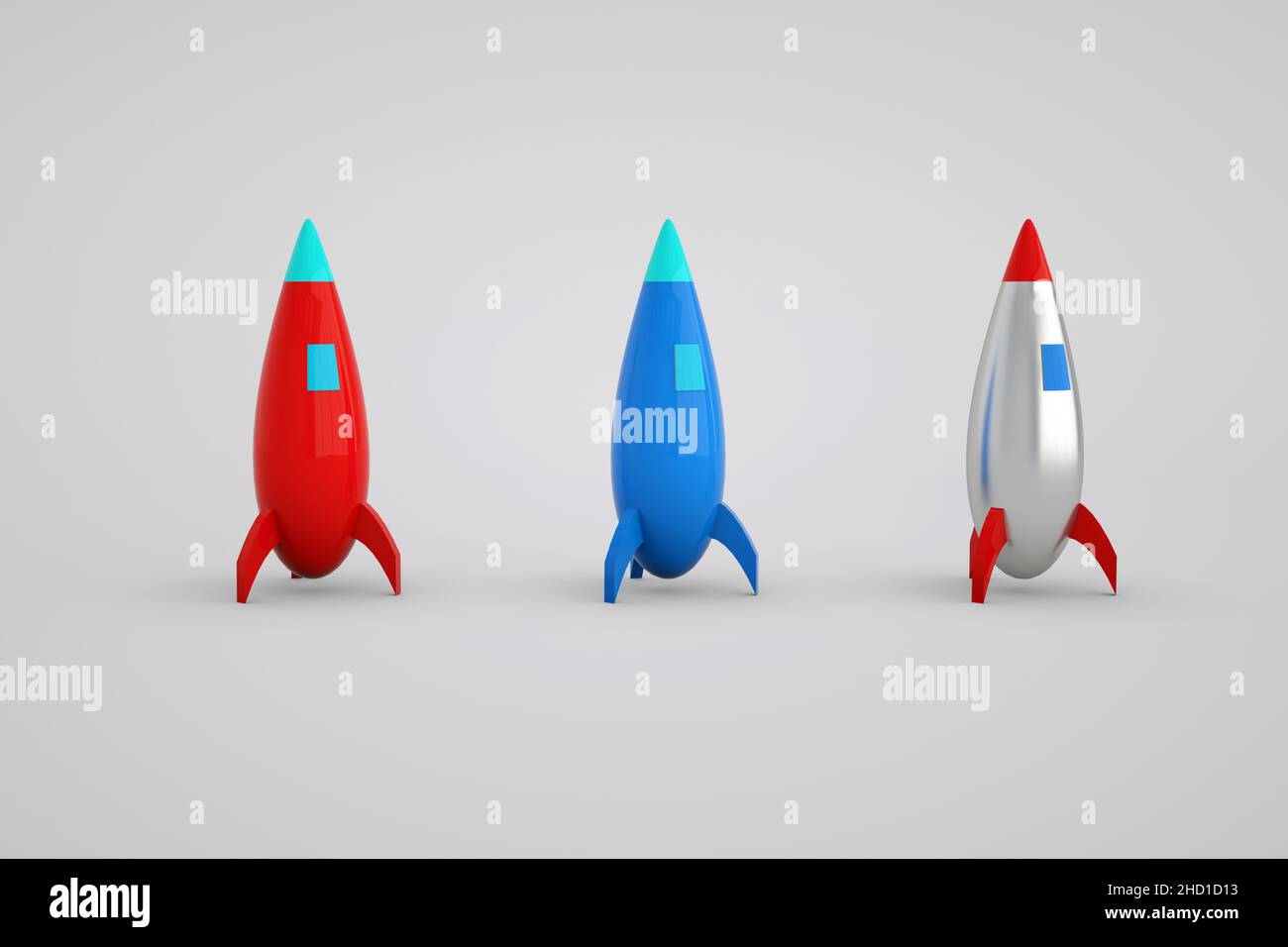 3D render three colored rockets on a white background. Isolated cartoon ...