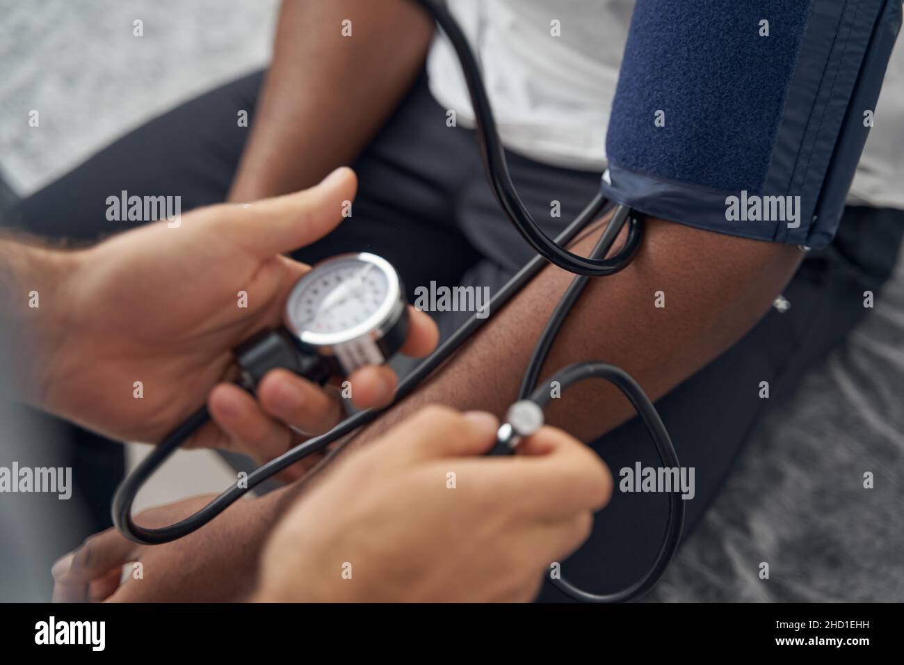 African American patient undergoing routine medical check-up Stock ...