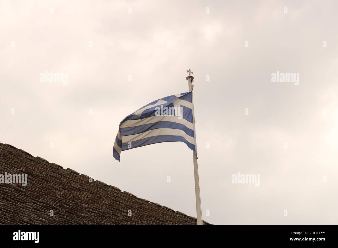 Flag of greece flying hi-res stock photography and images - Alamy