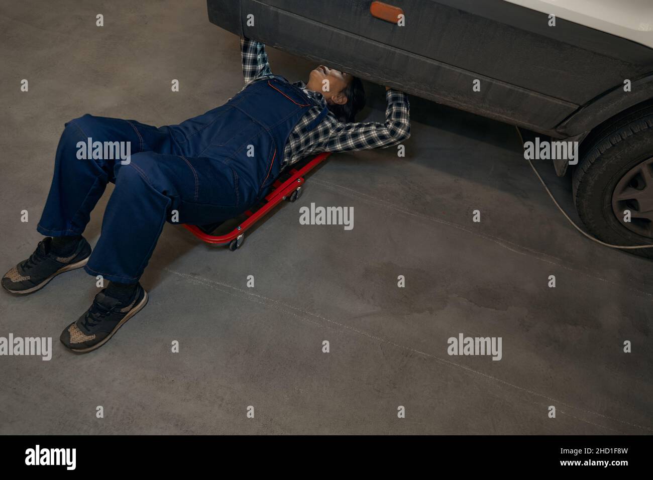 Woman laying down car hi-res stock photography and images - Alamy