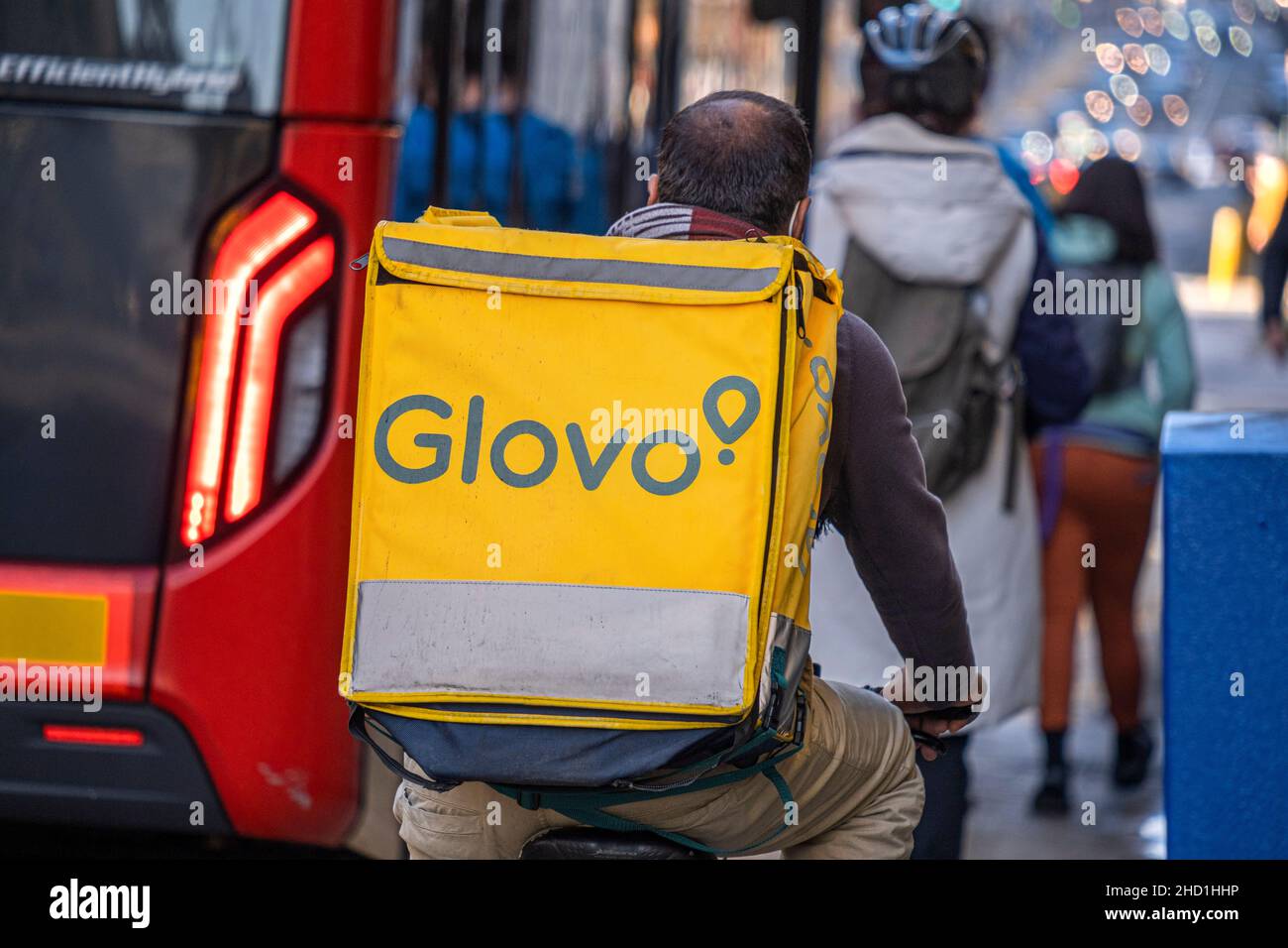 Home delivery man with a bicycle known as "Glovers" from the Spanish ...