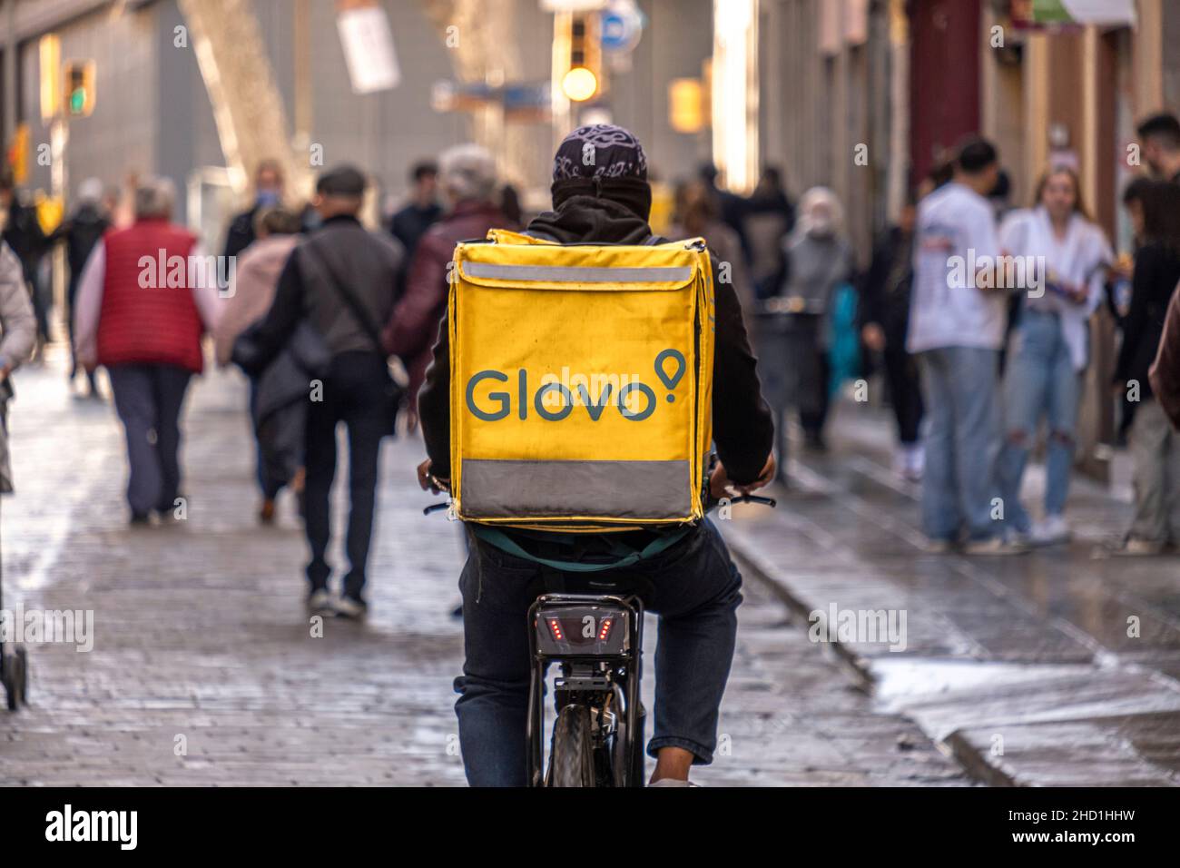 Home delivery man with a bicycle known as "Glovers" from the Spanish ...