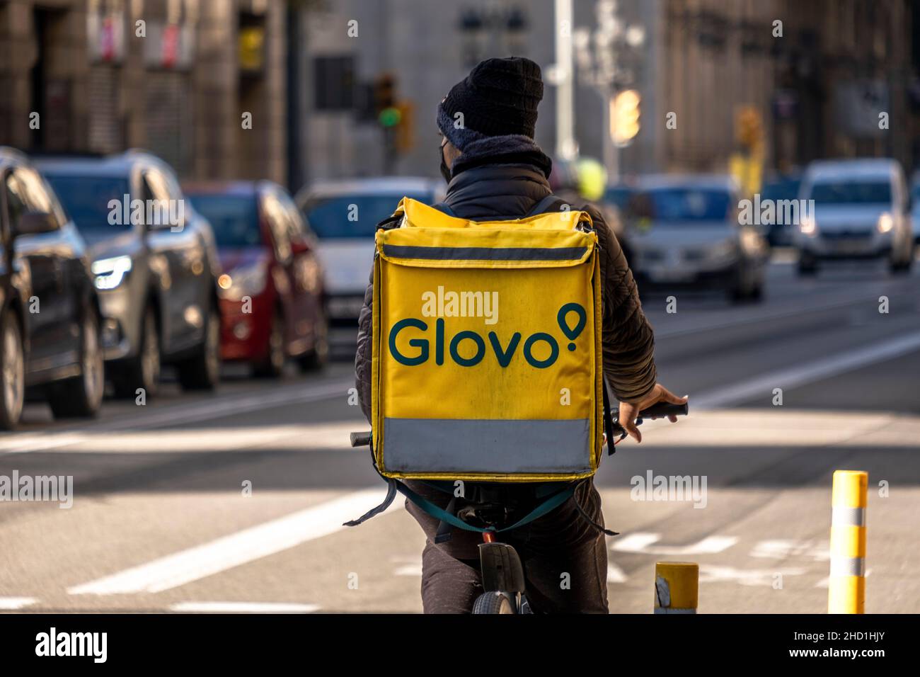 Home delivery man with a bicycle known as "Glovers" from the Spanish ...