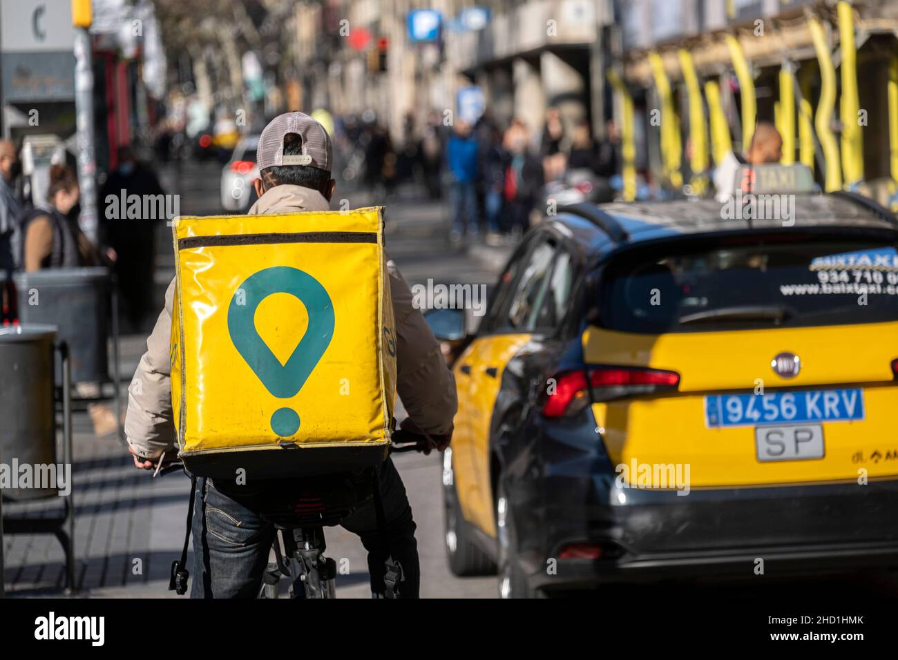 Home delivery man with a bicycle known as "Glovers" from the Spanish ...