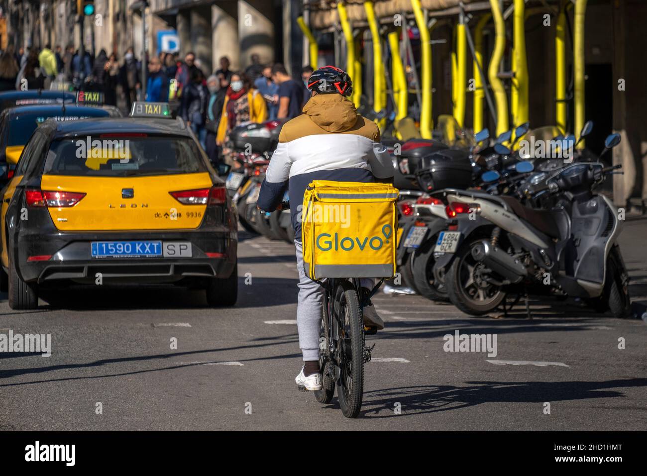 Home delivery man with a bicycle known as "Glovers" from the Spanish ...