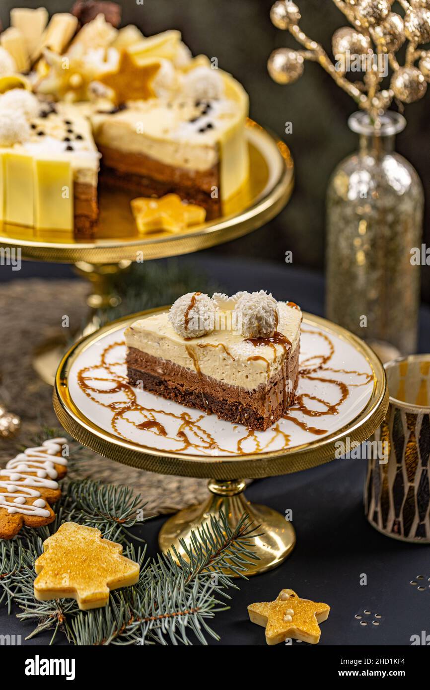 Triangle slice cake with three layers of different taste decorated with ...