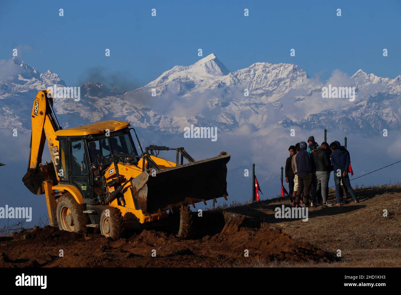 January 1, 2022, Kathmandu, NE, Nepal: A man operates an excavator to ...