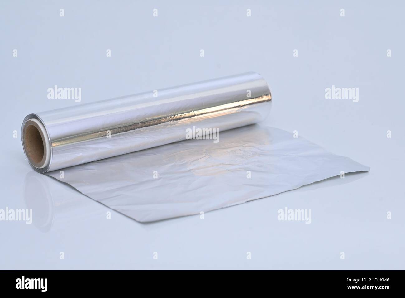 Aluminum Foil Paper Roll Isolated over White Background Stock Photo - Alamy
