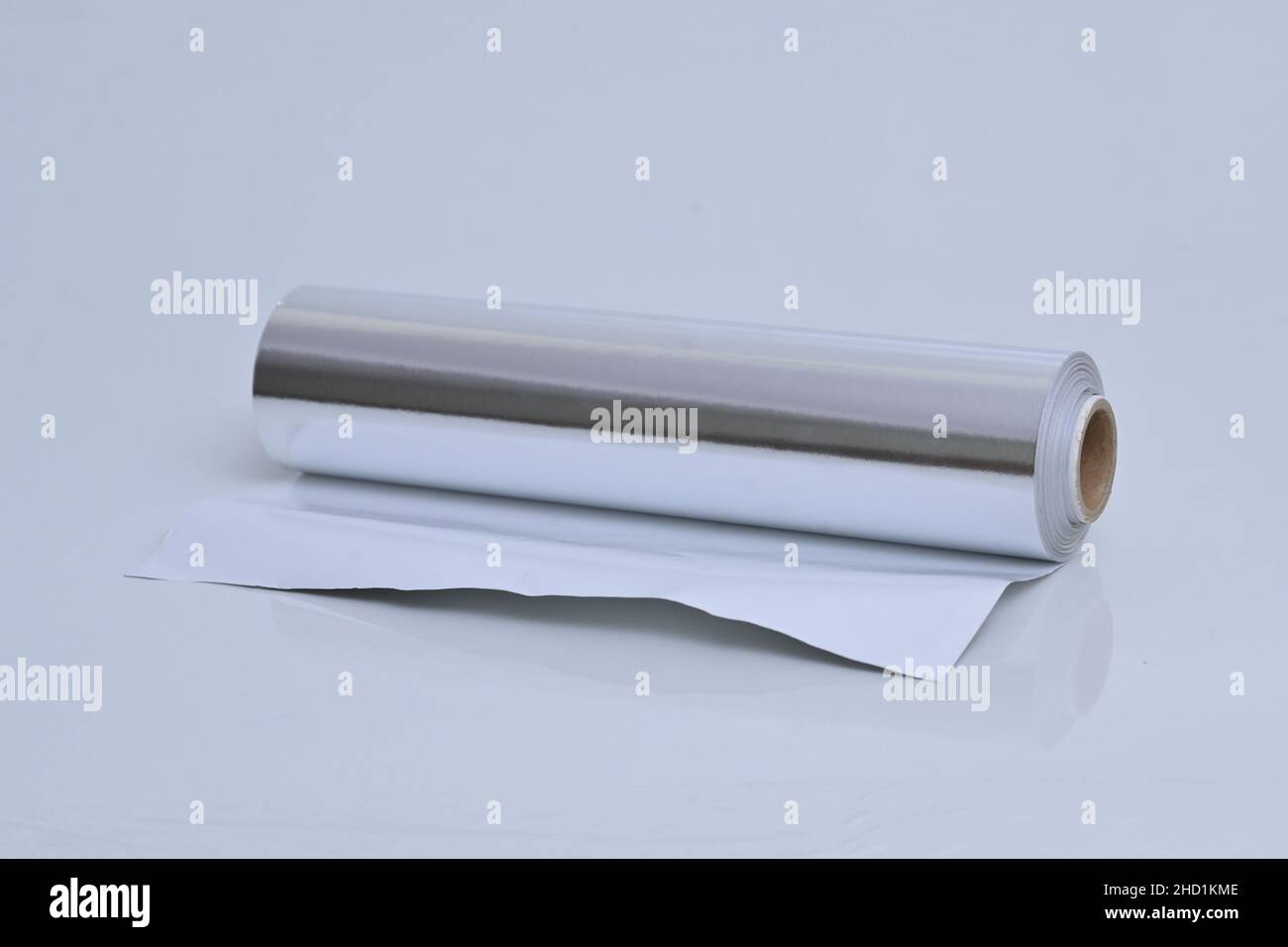 Aluminum Foil Paper Roll Isolated over White Background Stock Photo - Alamy
