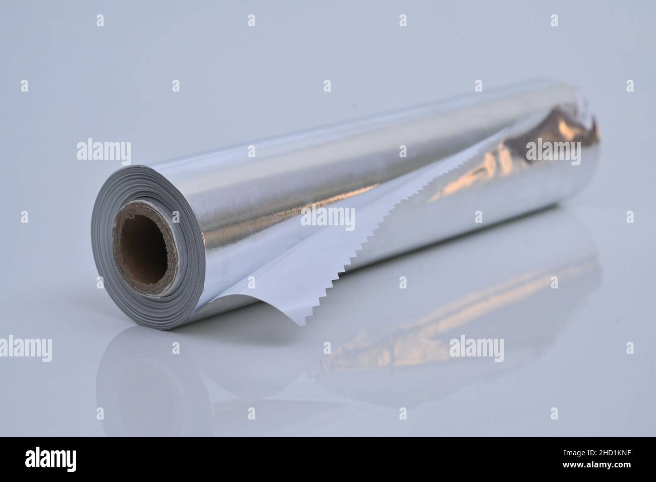 Aluminum Foil Paper Roll Isolated over White Background Stock Photo - Alamy