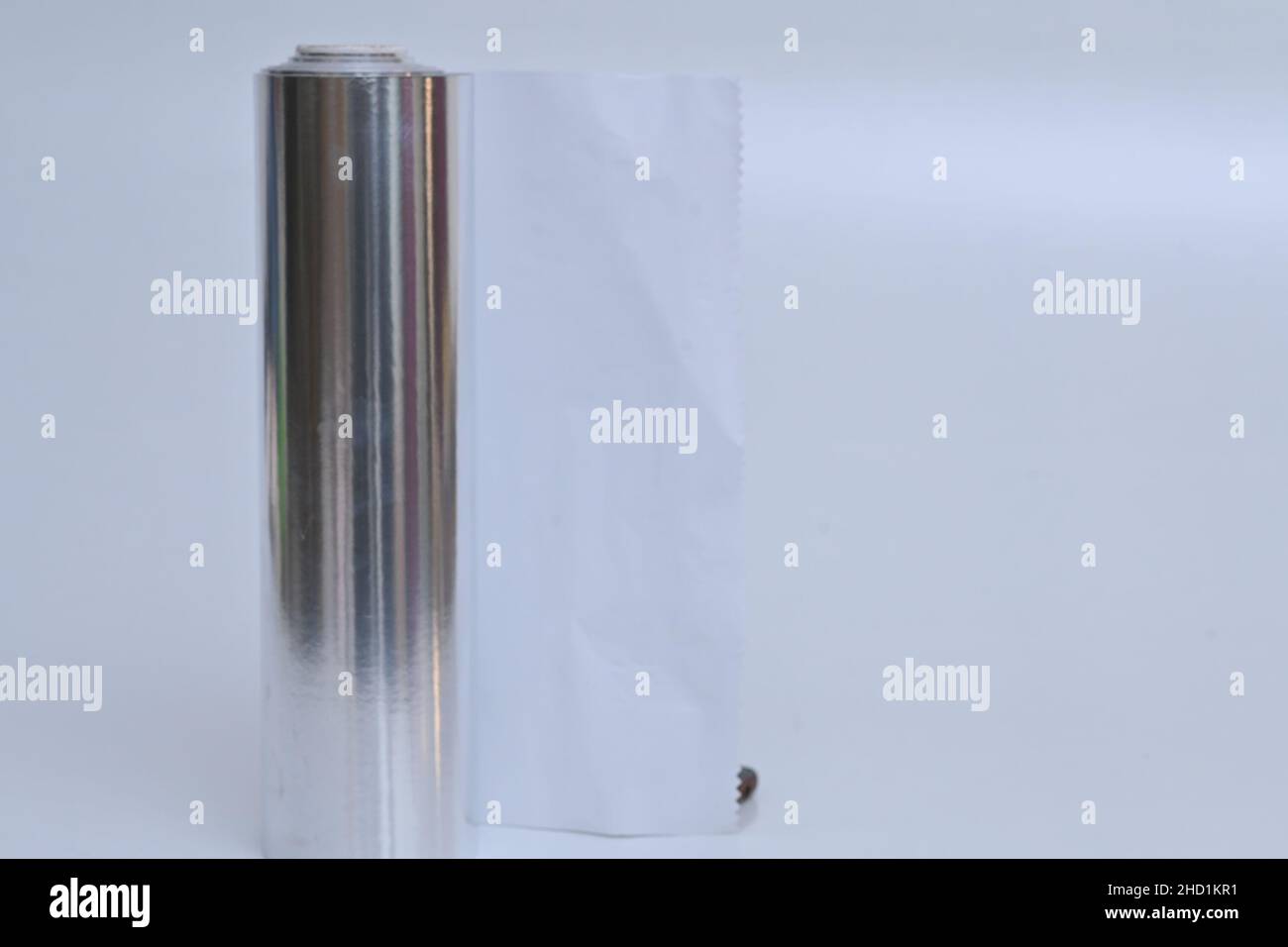 Aluminum Foil Paper Roll Isolated over White Background Stock Photo - Alamy
