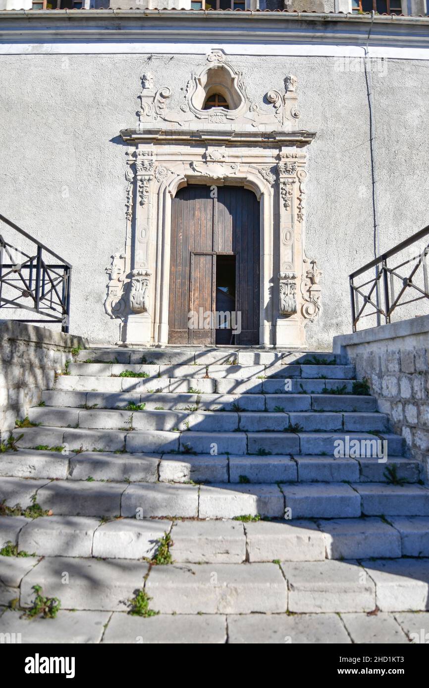 The facade of an ancient church in Pignola, medieval village of ...