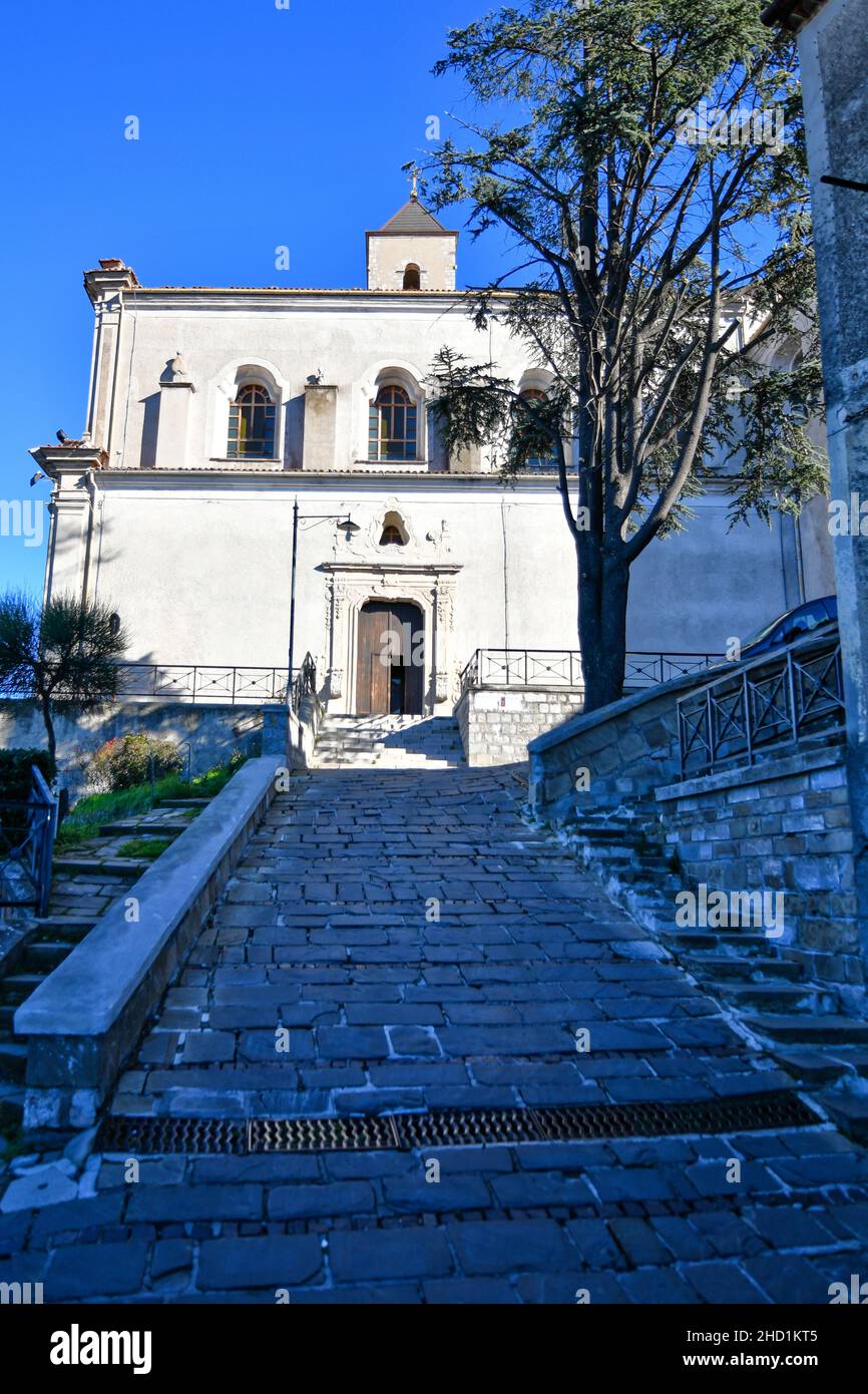 The facade of an ancient church in Pignola, medieval village of ...