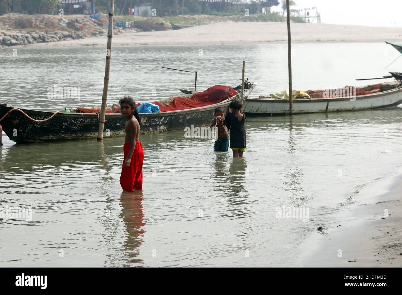 Hundreds of Gypsy families live in small wooden boats on the bank of ...