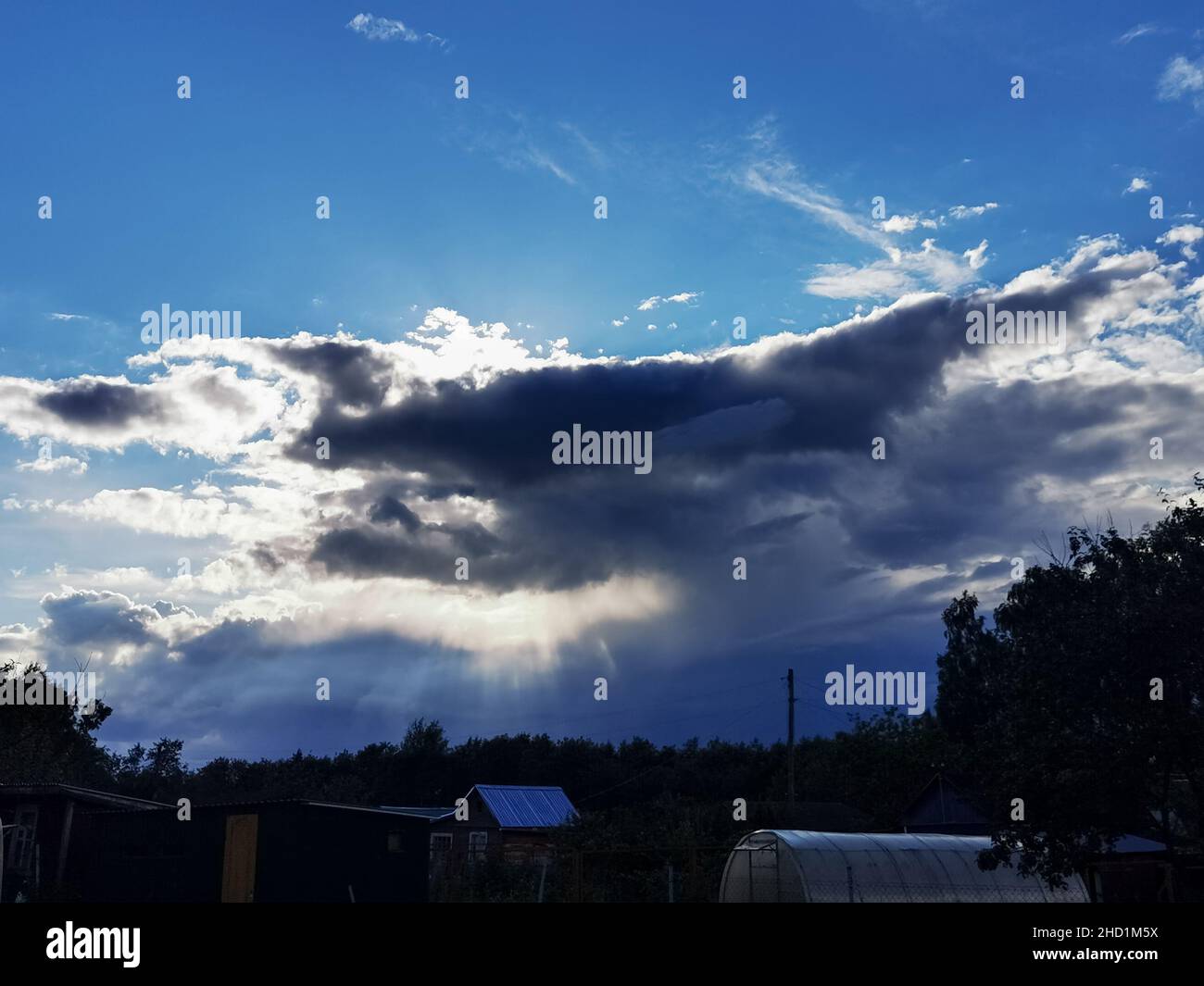 Beautiful cloud covering sun hi-res stock photography and images - Alamy
