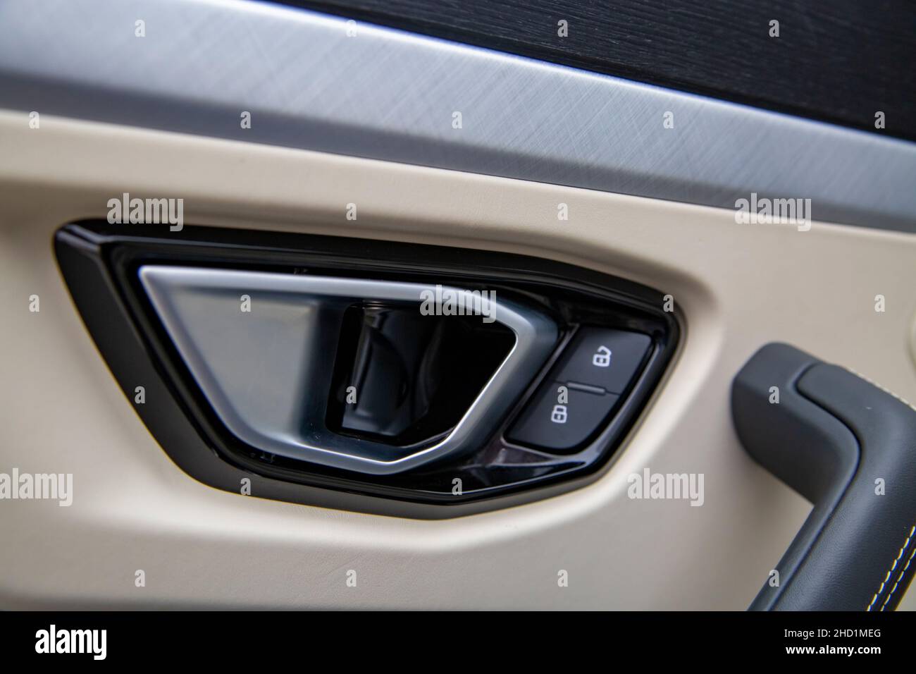 door lock button on a door handle in a modern car Stock Photo - Alamy