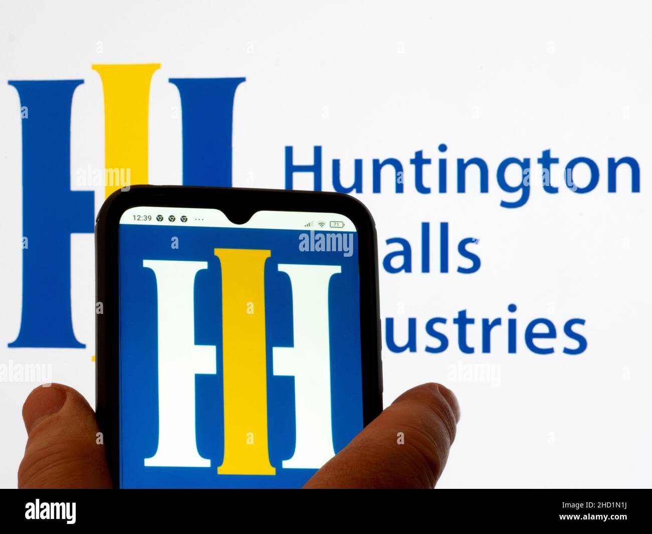 In this photo illustration Huntington Ingalls Industries, Inc. logo ...
