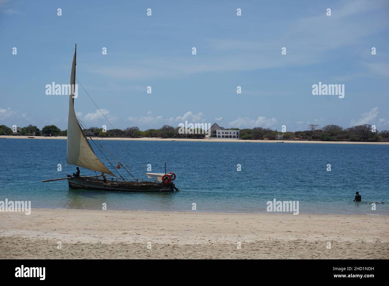 Traditional Dhow passing by between Lamu Island and Manda Island, Kenya ...