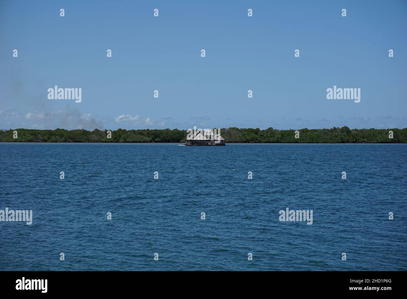 Floating bar with Manda Island in the background, Lamu Island, Kenya ...