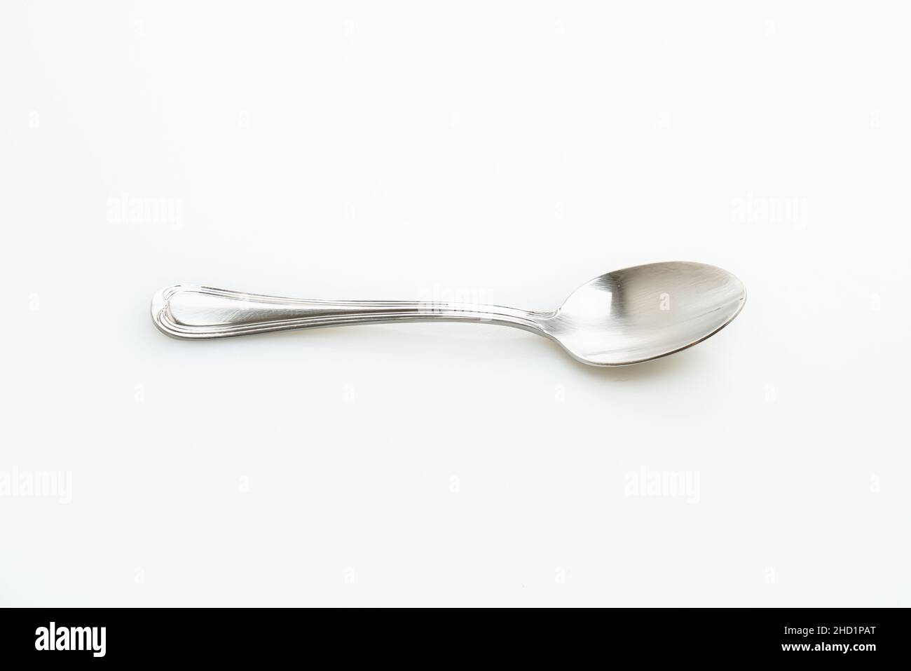 silver spoon isolated on white background Stock Photo - Alamy