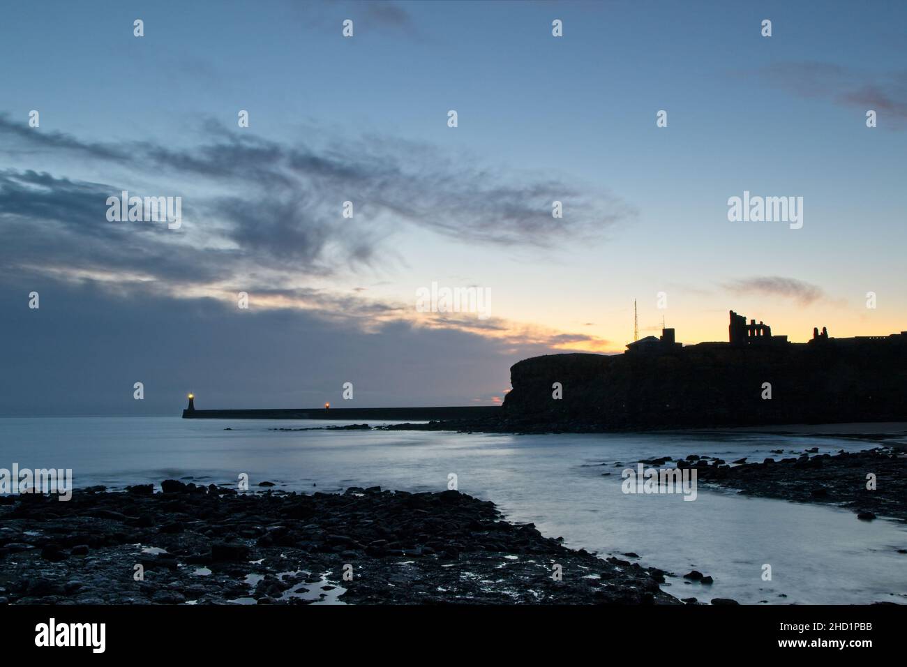 Sunrise at King Edwards Bay, Tynemouth, North Tyneside. The pier and ...