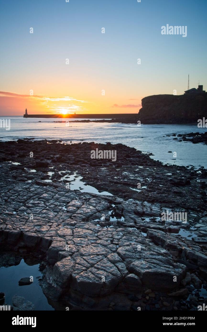 Sunrise at King Edwards Bay, Tynemouth, North Tyneside. The pier and ...