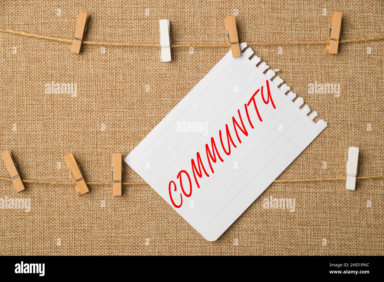 Hand Writing Sign Community Business Showcase Specific Population With A Common Characteristics