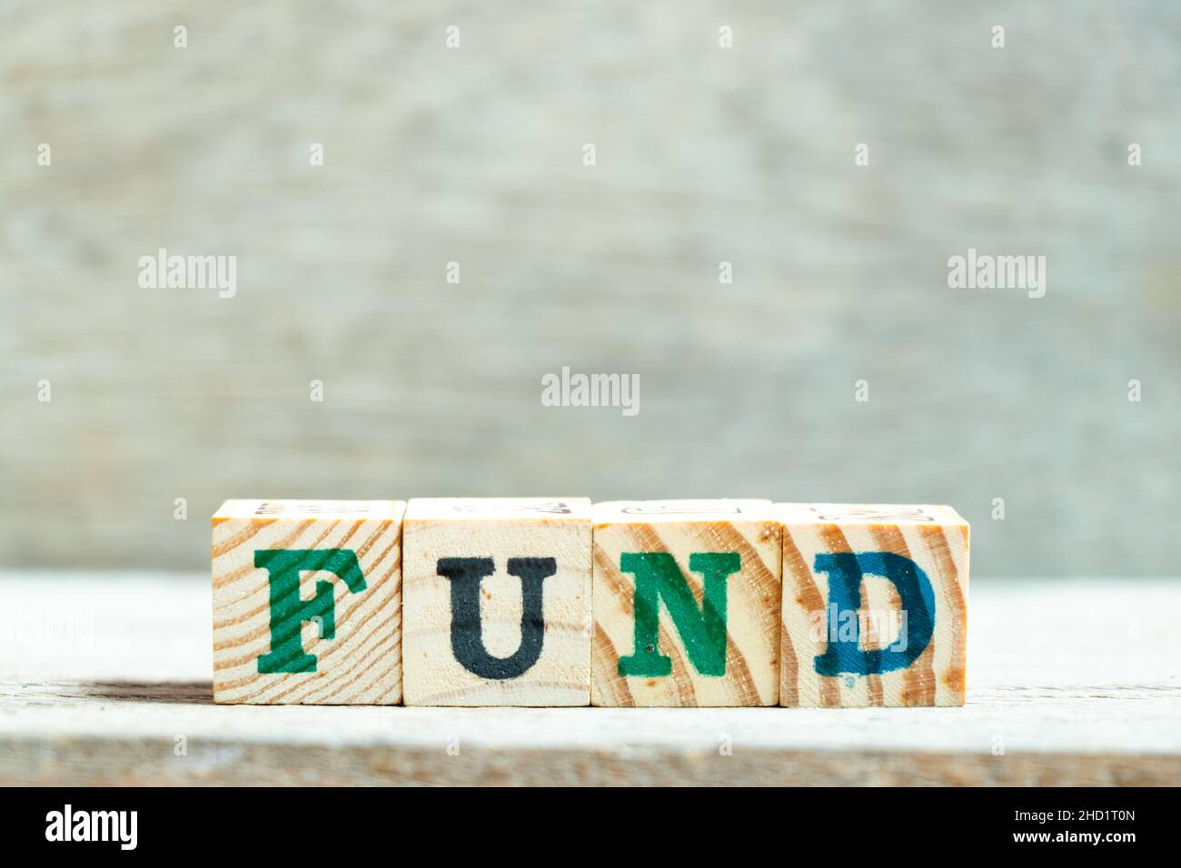 Alphabet letter block in word fund on wood background Stock Photo - Alamy