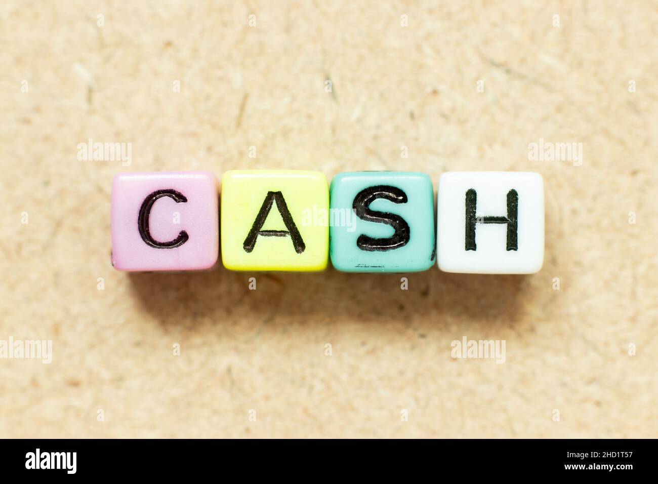 Color alphabet letter block in word cash on wood background Stock Photo ...