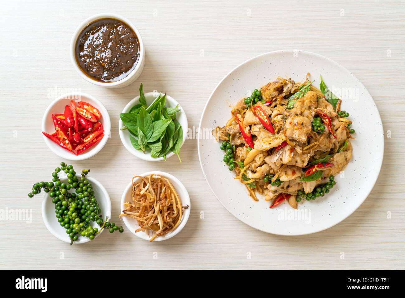 stir fried holy basil with fish and herb - Asian food style Stock Photo ...