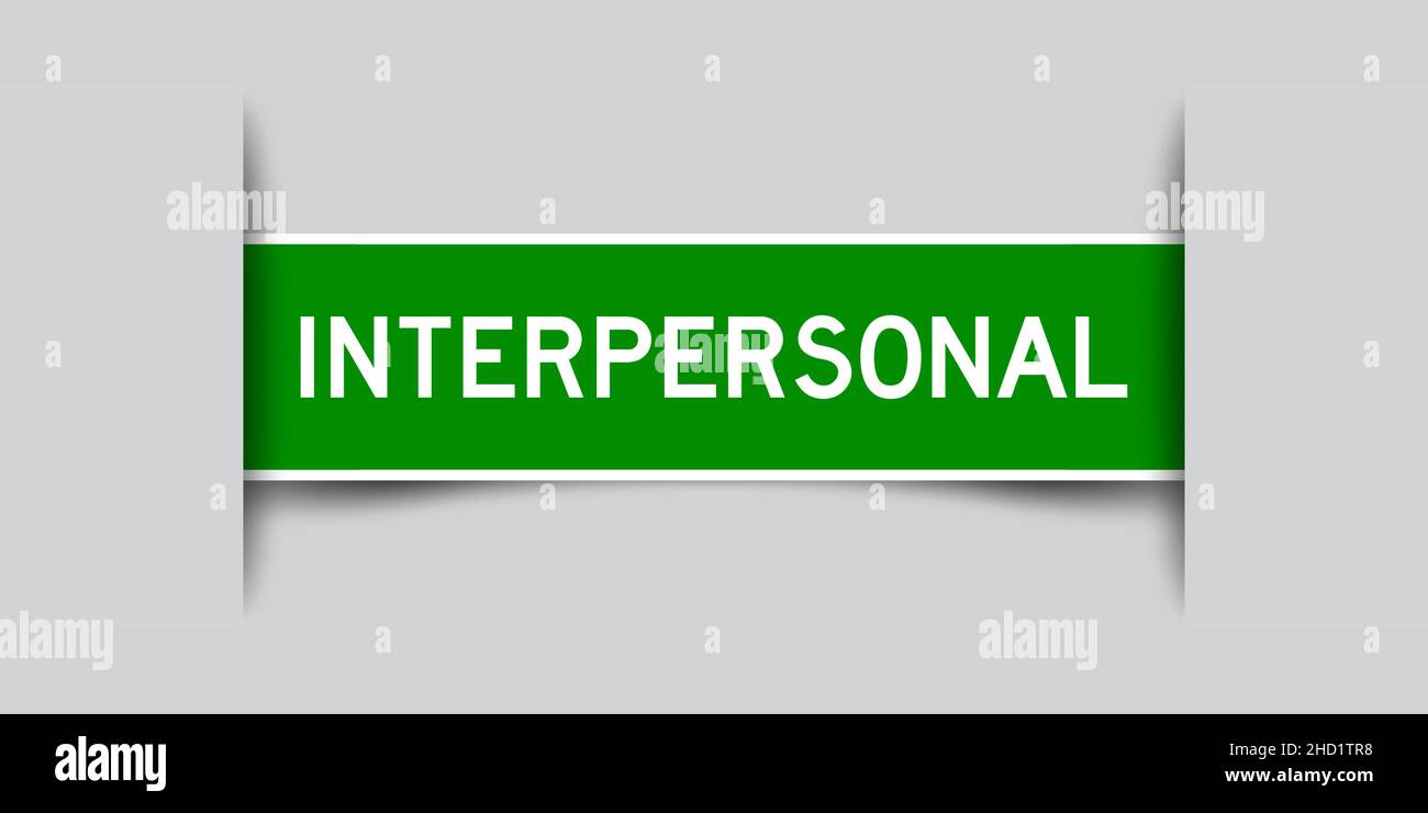 Inserted green color label sticker with word interpersonal on gray ...
