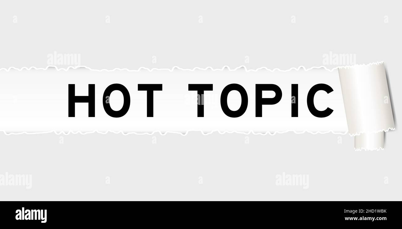 Ripped gray paper background that have word hot topic under torn part ...