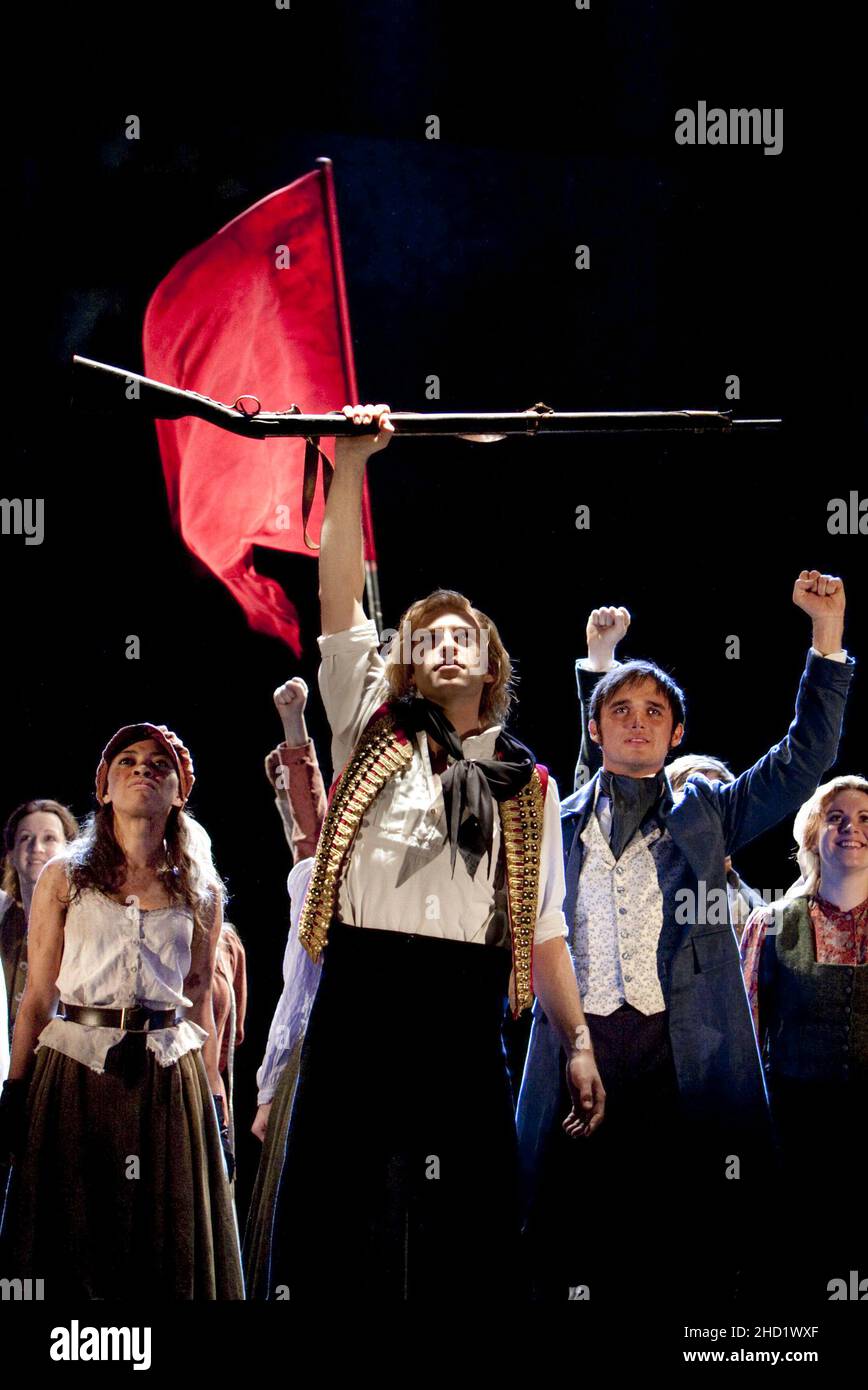 front centre, l-r: Rosalind James (Eponine), Jon Robyns (Enjolras ...