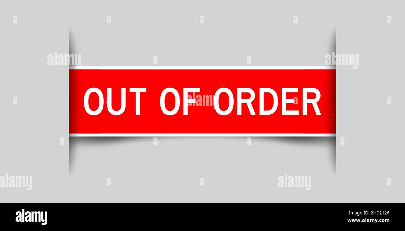 Inserted red color label sticker with word out of order on gray ...