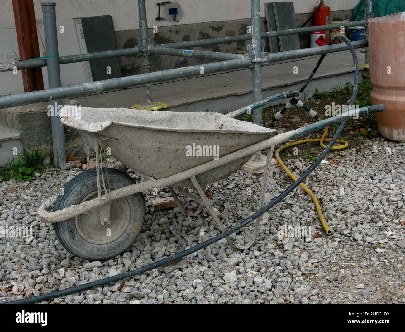 A closeup shot of a wheelbarrow used in a construction site Stock Photo ...