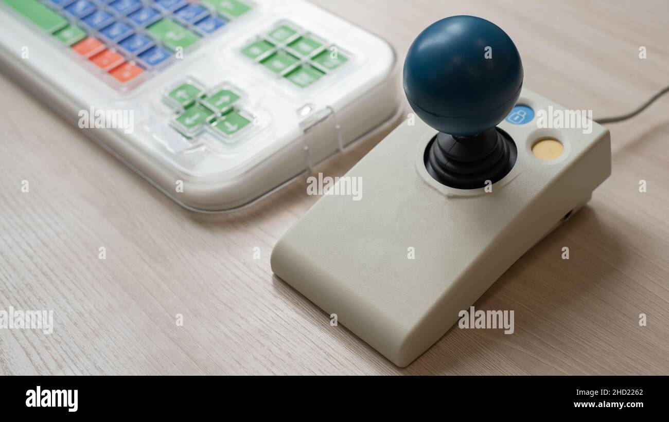 Close-up of a specialized computer mouse and keyboard for people with ...