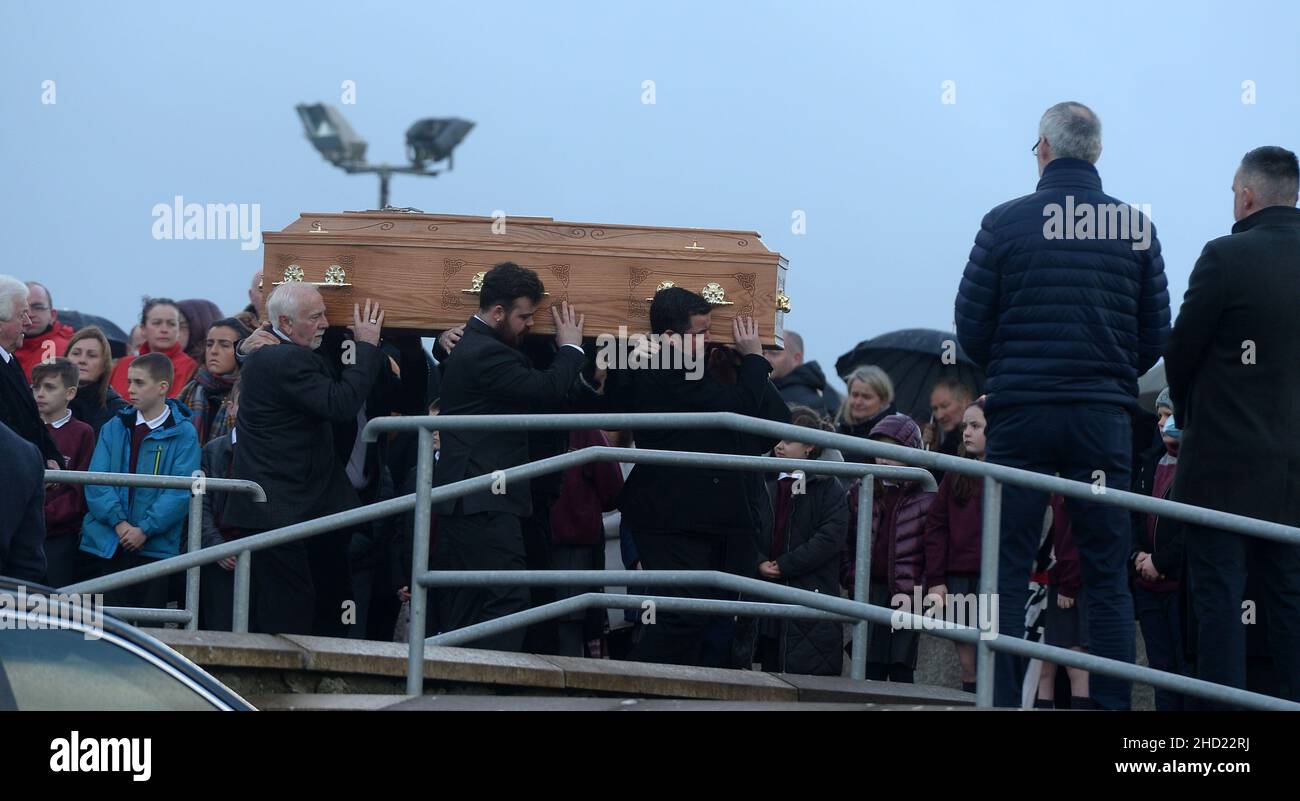 The coffin is carried in to the funeral sservice for Nathan Corrigan ...