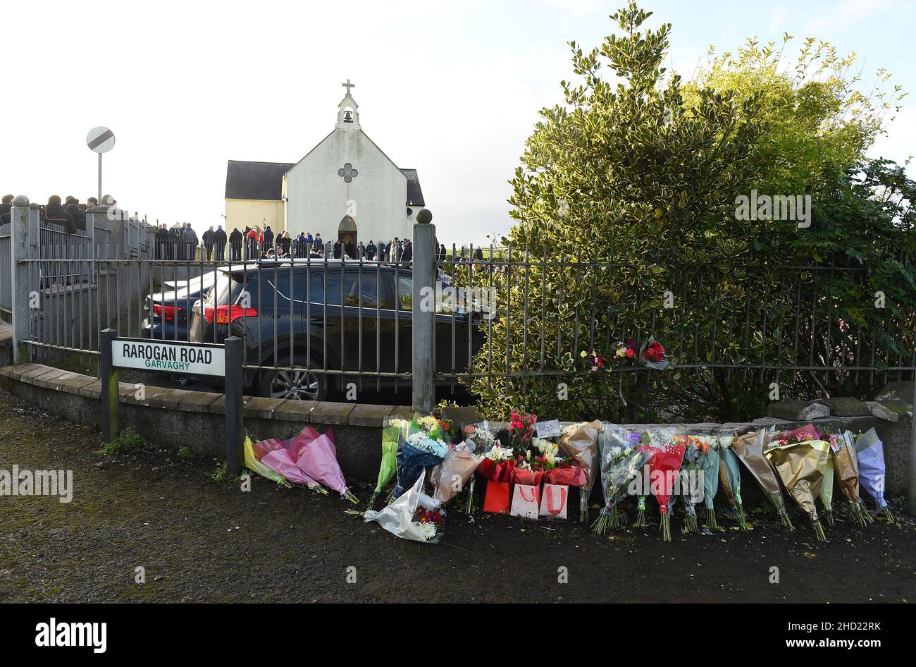 Flowers left at the scene of the road accident close to the funeral ...