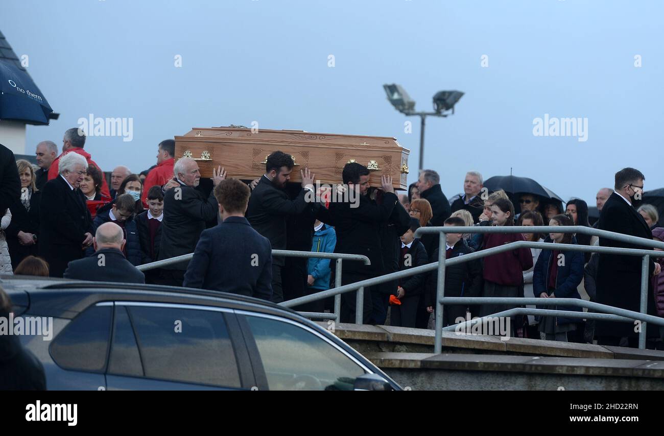 The coffin is carried in to the funeral sservice for Nathan Corrigan ...