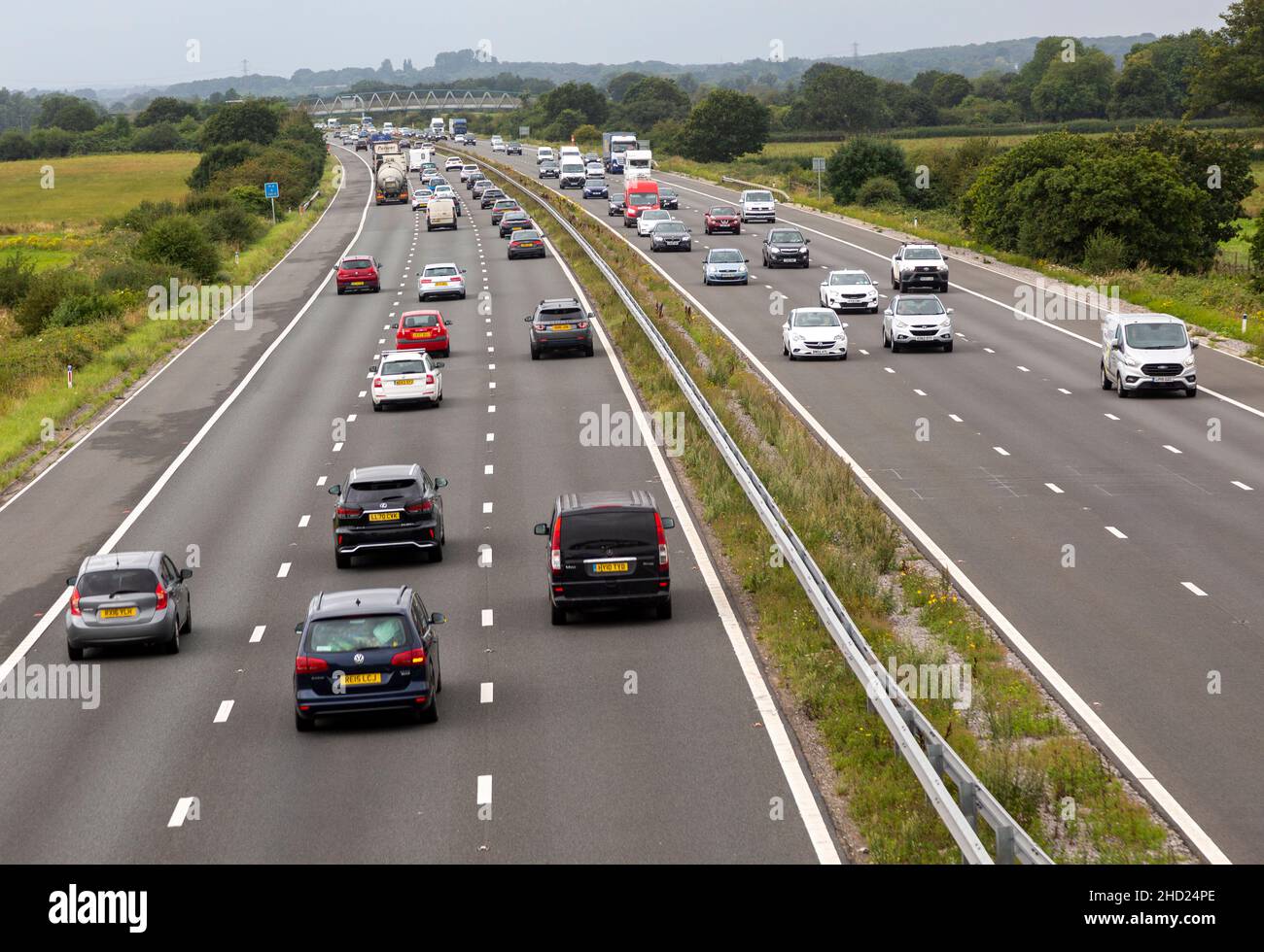 Traffic vehicles driving M4 motorway view west from near Dauntsey ...