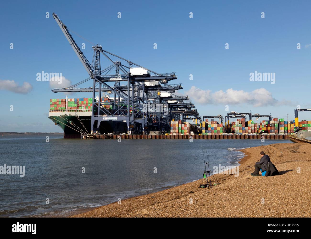 Man Unloading Shipping Container