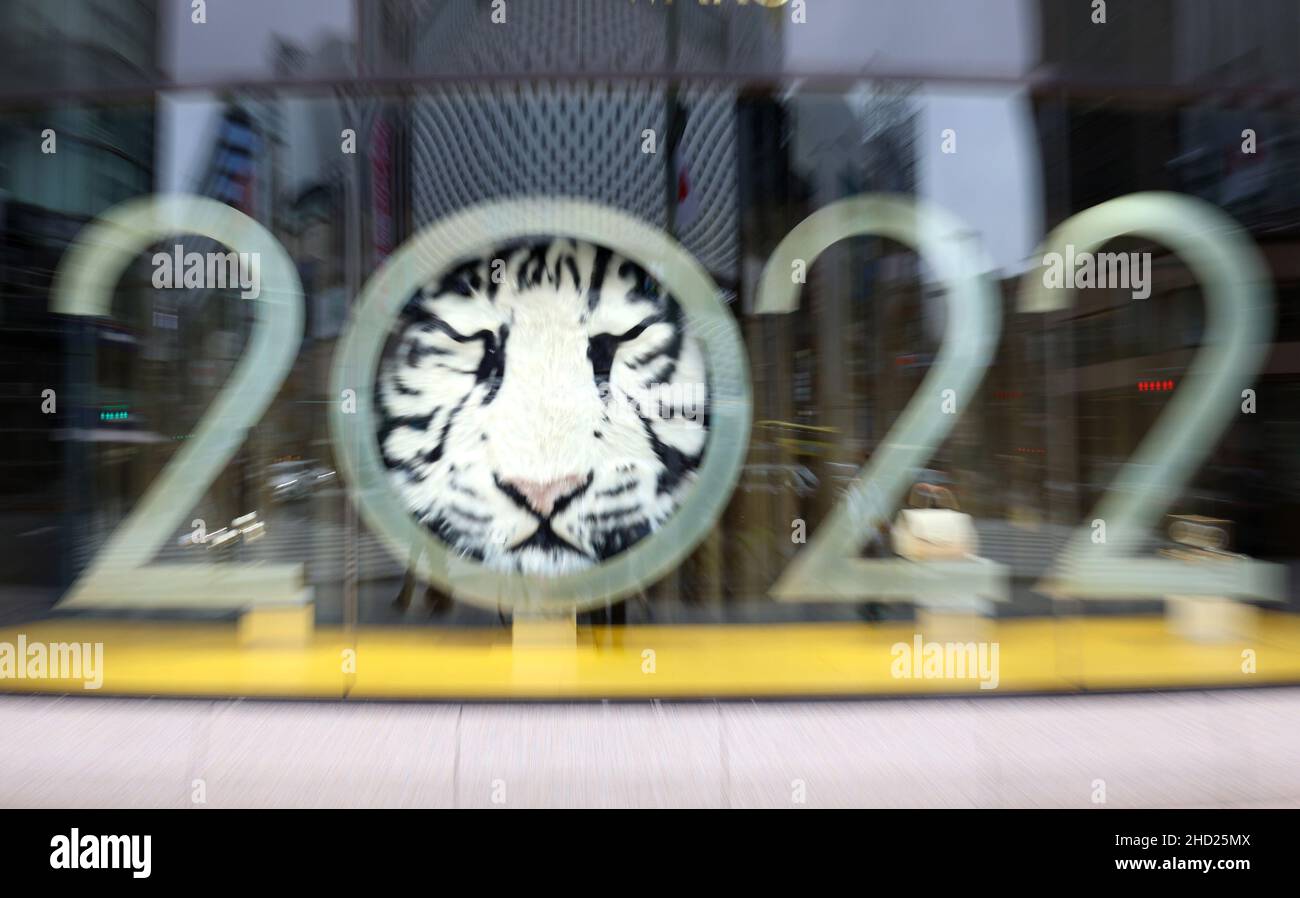 Tokyo, Japan. 31st Dec, 2021. A large window of a shop displays the ...