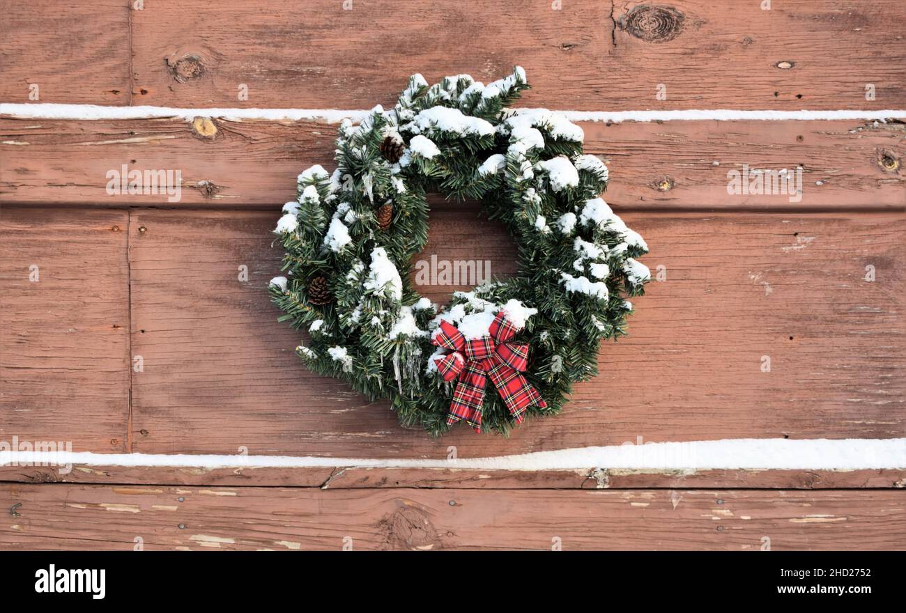Christmas wreath with snow Stock Photo - Alamy