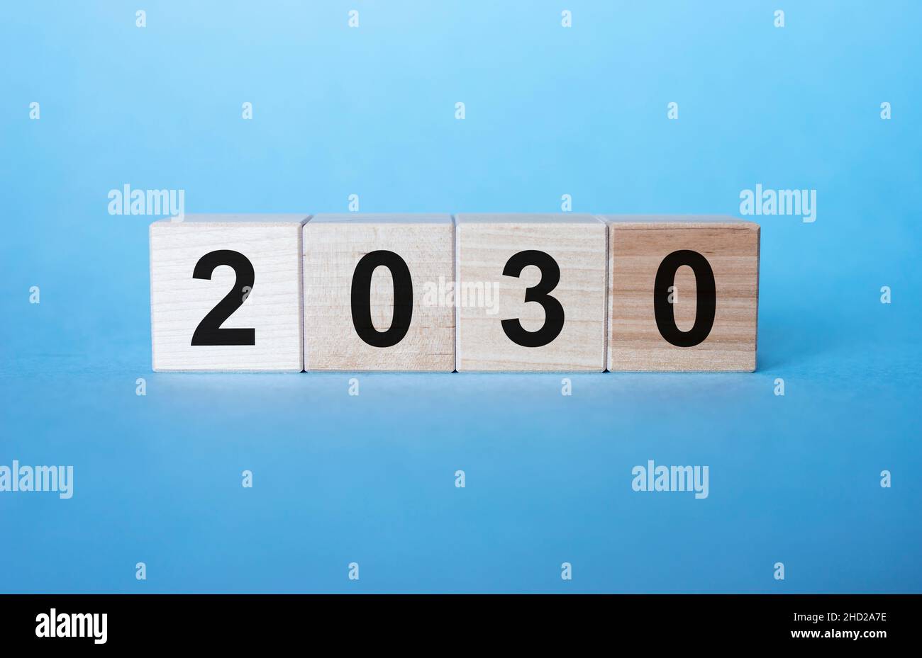 year of 2030 inscription on cubes on light blue background Stock Photo ...